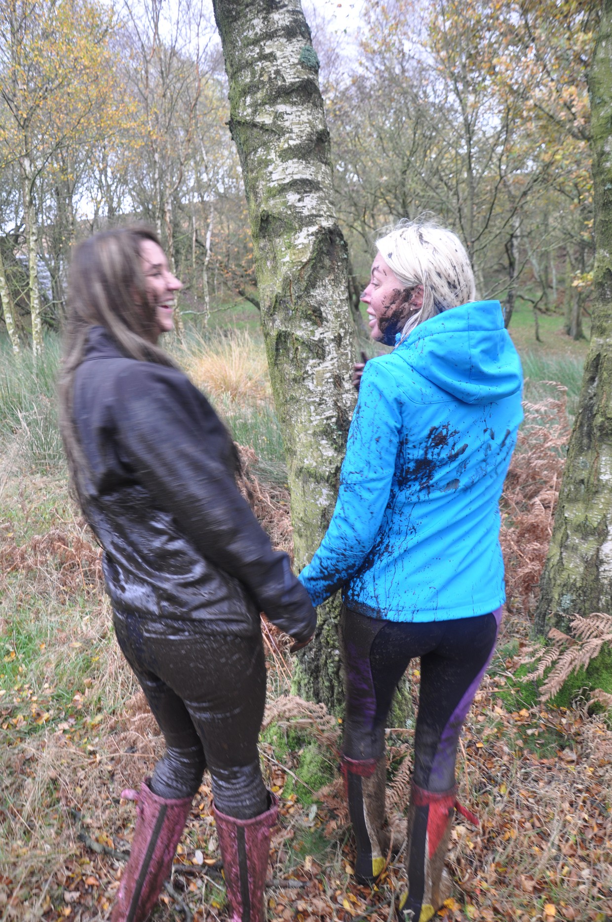 Charn and Simone mud wrestle - wellies women mess